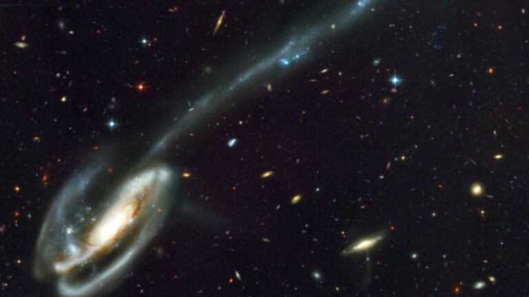 Cluster of 30 discovered — NASA puzzled by objects circling something ...