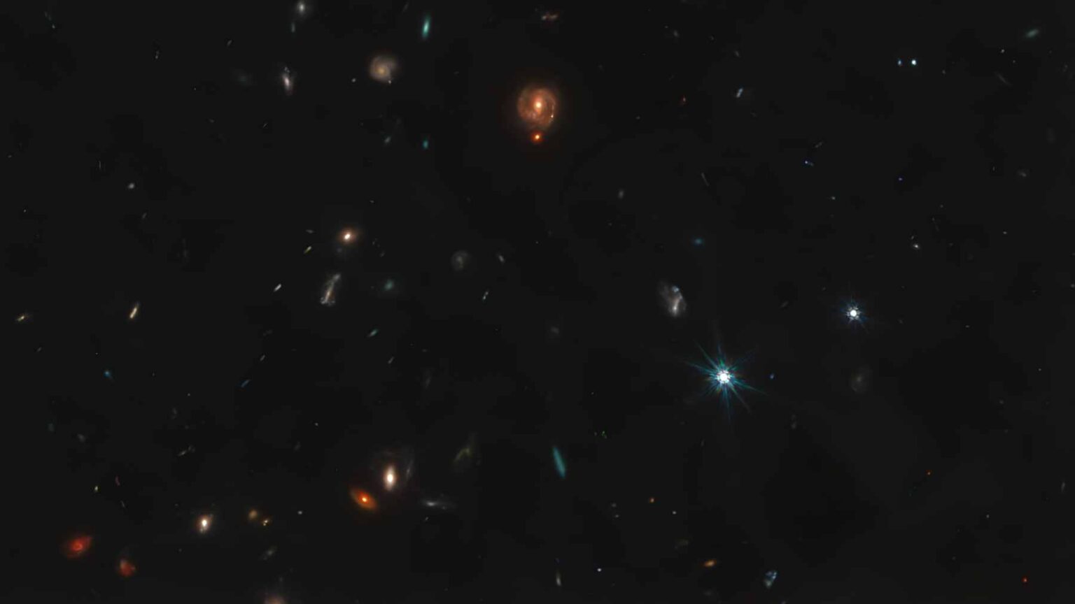 The James Webb Space Telescope detected strange red spots in the early ...